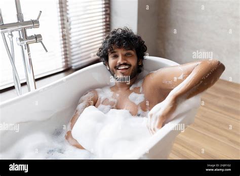 Wellbeing Body Care Concept Happy Relaxed Indian Man Taking Bubble