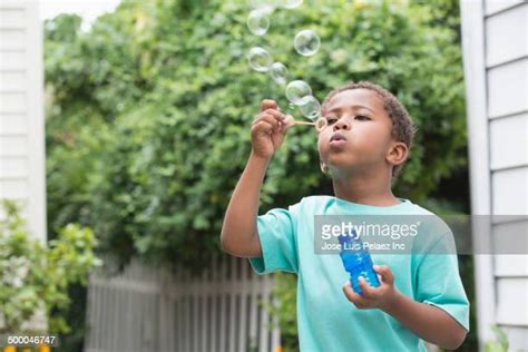 Black Boy With Bubbles Photos And Premium High Res Pictures Getty Images