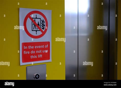 Fire Safety Do Not Use In The Event Of Fire Warning Sign Next To Lift Doors In A Multi Storey