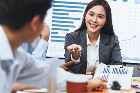 Young Asian Businesswoman Presenting Data Analysis Dashboard On Tv Concord Stock Image Image