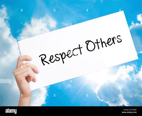 Respect Others Sign On White Paper Man Hand Holding Paper With Text