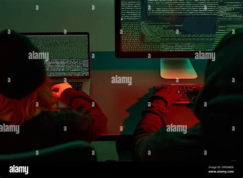 Anonymous People Using Computer And Programming To Break Code Cyber Security Threat Internet