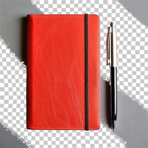 Premium Psd A Red Notebook With A Pen On It And A Pen On The Cover