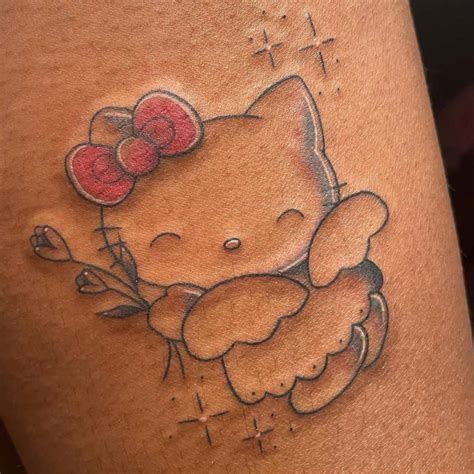 Hello Kitty Cupcake Tattoos Designs