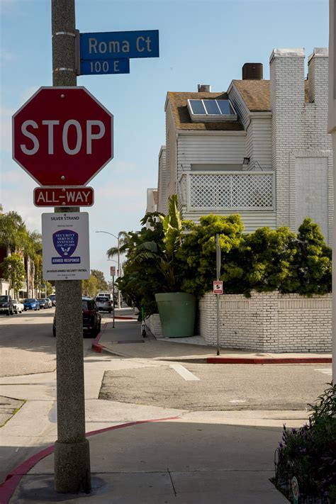 A Red Stop Sign Sitting On The Side Of A Road Photo Free Los Angeles