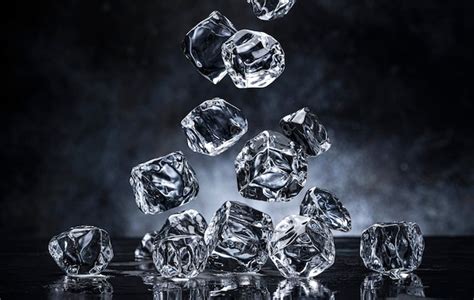 Premium Photo Falling Ice Cubes On Black Background