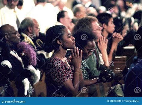 Christian People Praying In Church