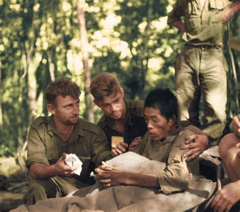 二战彩色老照片：神情呆滞的日本战俘、坐在德军坦克上的法国女人