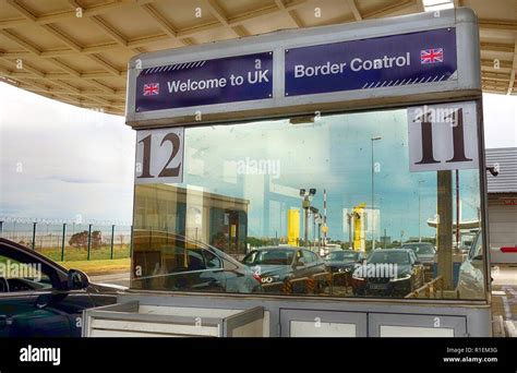 Calais France August 12 2018 Cars Reflected In The Window Of A Uk