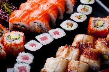 Maki Sushi Or Sushi Rolls Sushi Rice Rolled Up In Nori