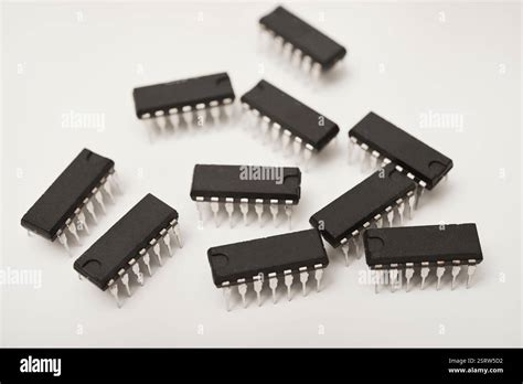 A Microcontroller On A White Background An Electronic Chip In A Plastic Case Stock Photo Alamy