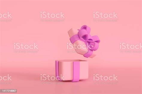 캐러멜 배경에 분홍색 리본 활이있는 3d 오픈 선물 상자 카라멜 색상 크리스마스 생일 광고 프로모션 3d 렌더링 그림 3차원