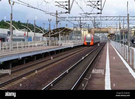Modern Intercity High Speed Train At Sunset Commercial Suburban Railroad Transportation Concept