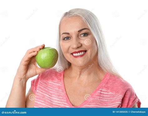 Femme De Sourire Avec Les Dents Parfaites Et La Pomme Verte Image Stock