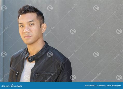 Portrait Of Filipino Male Top Model Posing With Copy Space On The Right