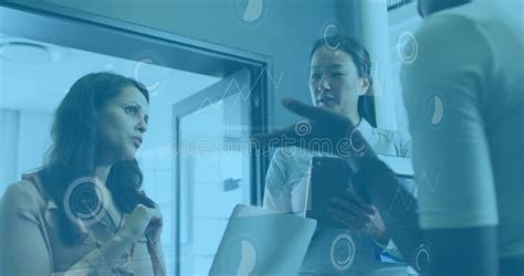 Image Of Statistical Data Processing Over Diverse Colleagues Discussing Together At Office Stock