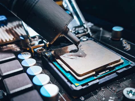 Applying New Thermal Paste To A CPU Thermal Paste Used As An Interface Between Heat Sinks And