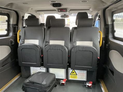 Interior Of A Black Taxicab Showing Foldaway Seating Editorial Stock