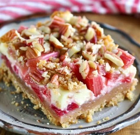 Creamy Rhubarb Cheesecake Bars With Buttery Crumble Topping