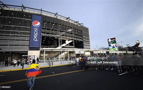 Soccer Fans Wait To Enter For A Match Between Mexico And Ecuador In
