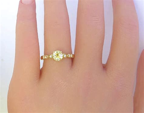Natural 098 Ctw Round Yellow Sapphire Ring With Diamonds In 14k Yellow