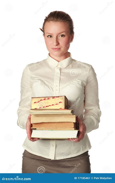 Strict Teacher Standing In Front Of Blackboard In Class Stock