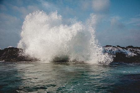 Royalty Free Photo Ocean Waves Taken Under White Clouds During Daytime