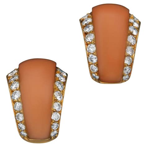 Van Cleef And Arpels Elegant Pair Of Fan Shaped Coral And Diamond Ear