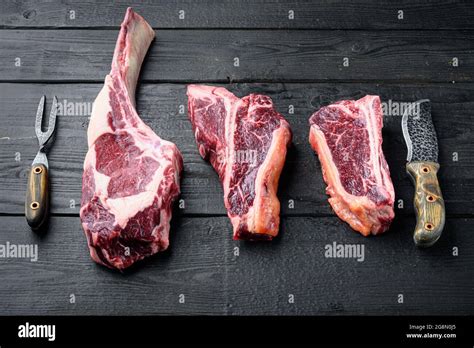 Dry Aged Raw Porterhouse Beef Meat Steak Set Tomahawk T Bone Or Porterhouse And Club Steak On