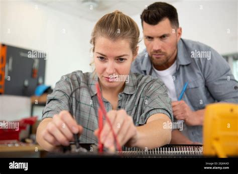 Woman Using Power Supply For The Computer Stock Photo Alamy