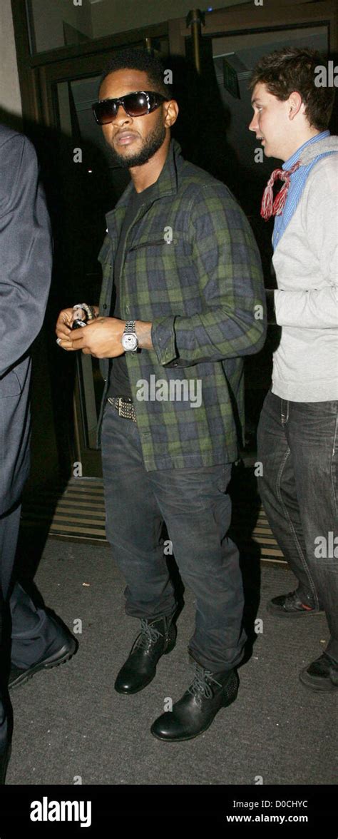 Randb Star Usher Unshaven And Wearing Dark Sunglasses Is Seen Outside