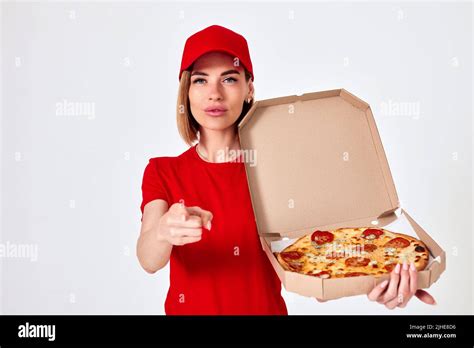 Pizza Delivery Girl Pointing Finger To Pizza On White Background Stock