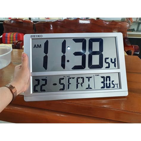 Seiko Digital Lcd นาฬิกาดิจิตอล แขวนผนังพร้อมขาตั้ง รุ่น Qhl080s Shopee Thailand