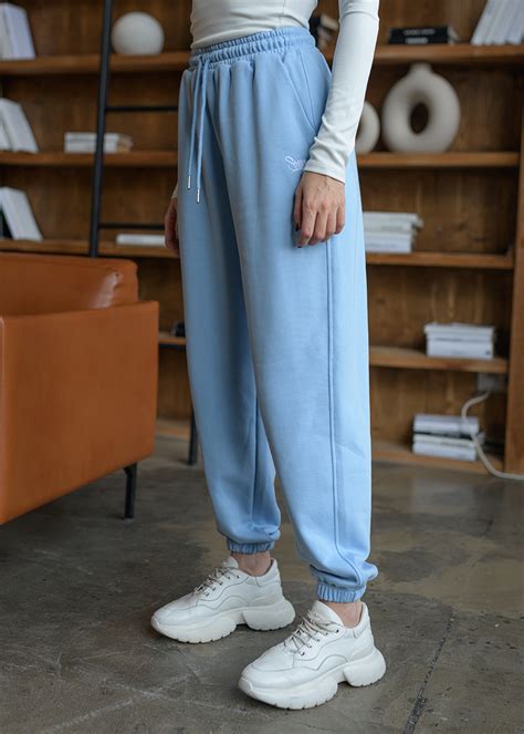 Спортивні штани жіночі Staff Ou Logo Light Blue блакитні молодіжні бавовняні з логотипом ціна