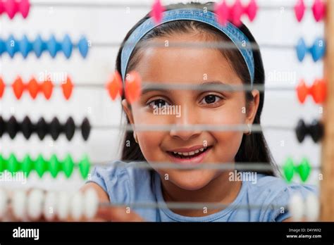 Girl Using An Abacus Stock Photo Alamy