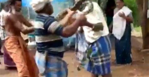 Watch Deadly Python Almost Chokes A Man To Death Locals Rush To Save