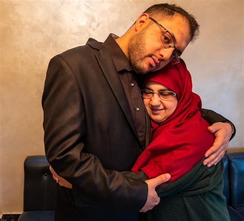 Premium Photo Happy Muslim Mother Hugging Her Son
