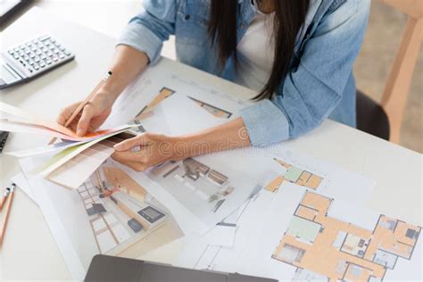 Design Building Concept Female Architect Works With Blueprint And