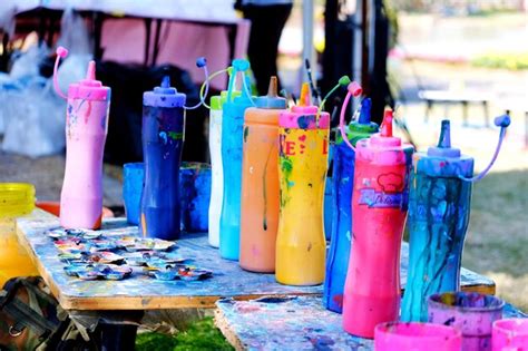 Premium Photo Multi Colored Messy Bottles On Table