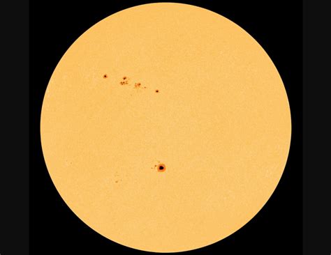 Huge Sunspot Four Times The Size Of Earth Visible Without A Telescope Newsweek