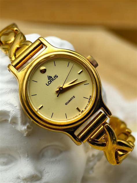 Vintage Lorus Ladies Gold Tone Quartz Watch With X Link Bracelet Etsy