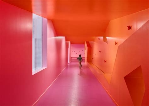 Bark Cladding And Clashing Colours Create Joyful Chaos In Parisian School