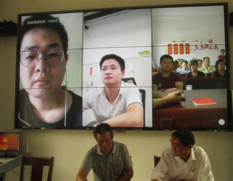 远在千里之外打工的党员通过“智慧党建”综合信息服务平台参会大武汉