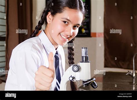 Indian Babe Girl Babe Checking Microscope Science Lab Research And Showing Thumbs Up