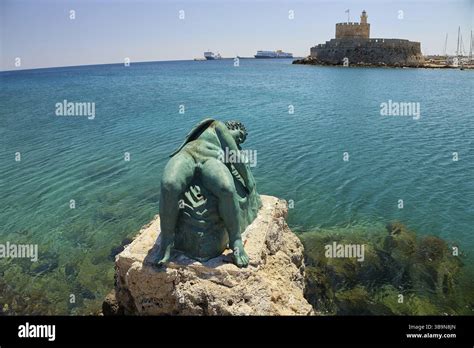Bronze Sculpture Sleeping Eros In Front Of A Castle By The Sea On A