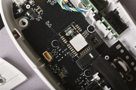 Premium Photo Separated Parts Of Broken Mouse Disassembled Computer Mouse For Repair And Fixing