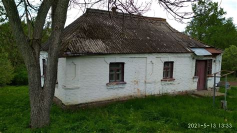 Житловий будинок загальною площею 42 1 кв м та земельна ділянка К Н 7121210100 01 004 1043