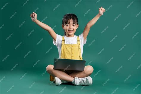 Premium Photo Beautiful Asian Girl Posing On Blue Background