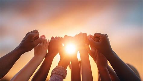 Premium Ai Image Universal Declaration Of Human Rights Document With Diverse Hands Holding It