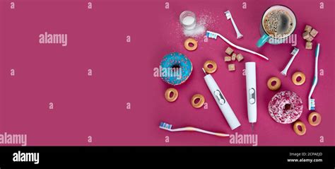 Variety Of Manual And Electric Toothbrushes Healthy And Unhealthy Food